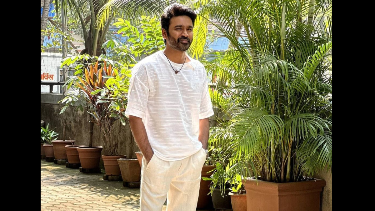 Dhanush Makes First Public Appearance Since Divorce Announcement Poses With Son Yathra